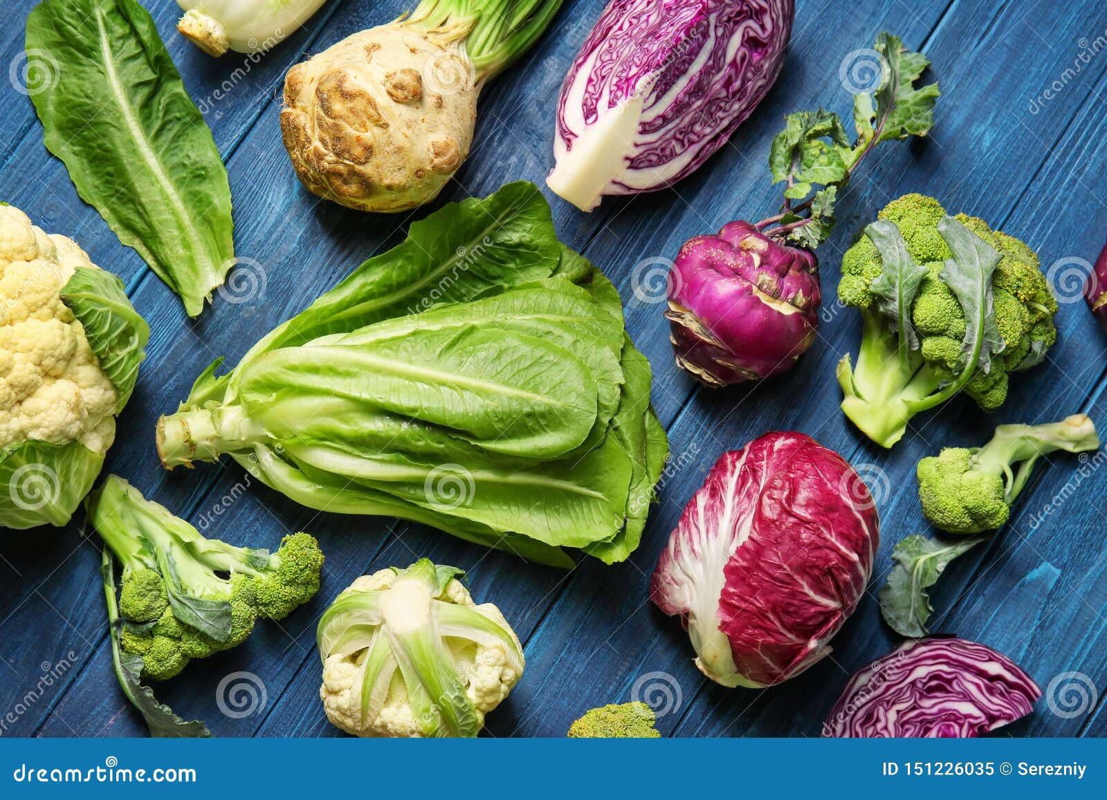 Different Types of Cabbage on Color Wooden Background Stock Image ...