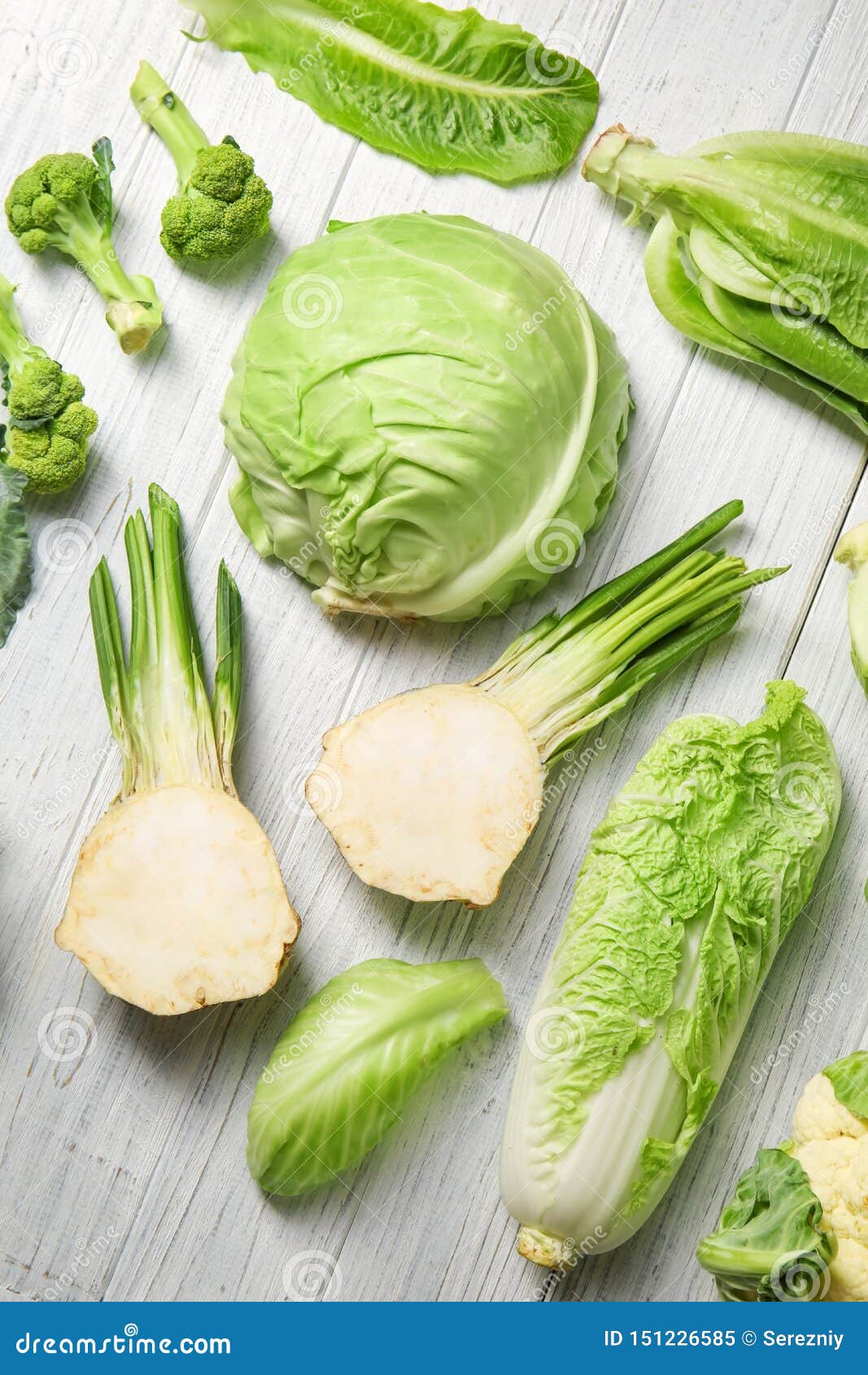 Different Types of Cabbage on Light Wooden Background Stock Image ...