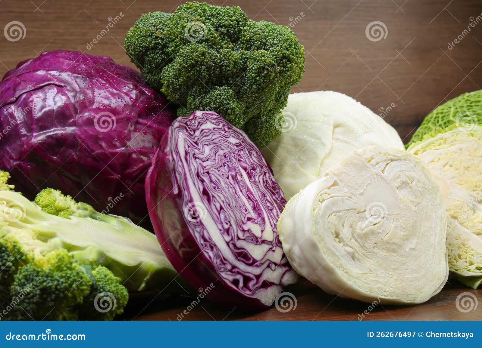 Different Types of Cabbage on Wooden Table, Closeup Stock Image - Image ...