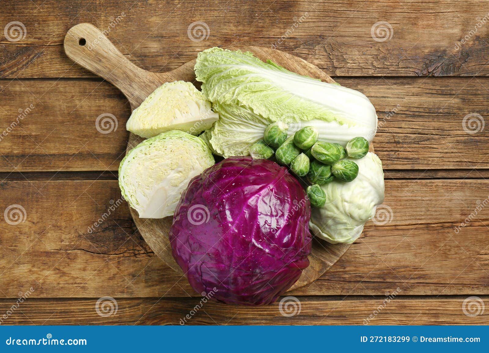 Different Types of Cabbage on Wooden Table, Top View Stock Image ...