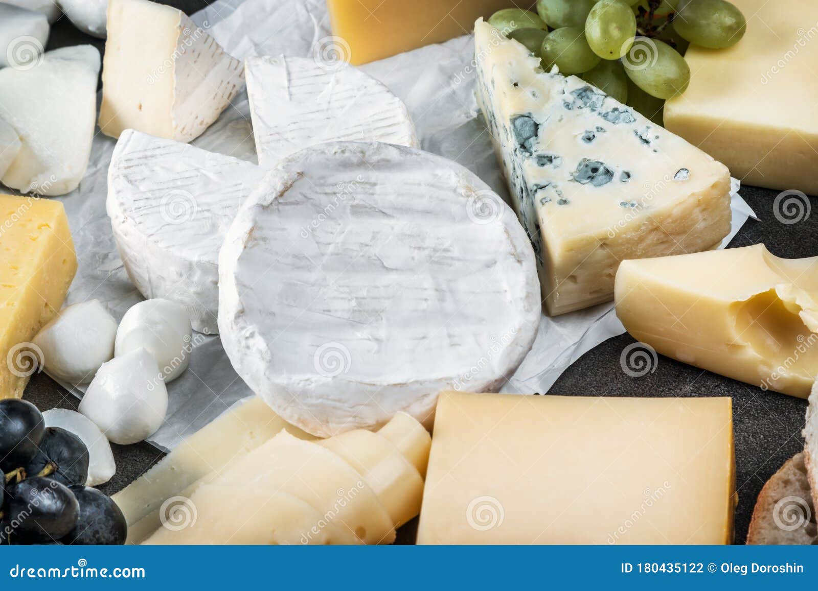 Different Types of Cheese with Fruits, Nuts and Snacks Stock Photo ...