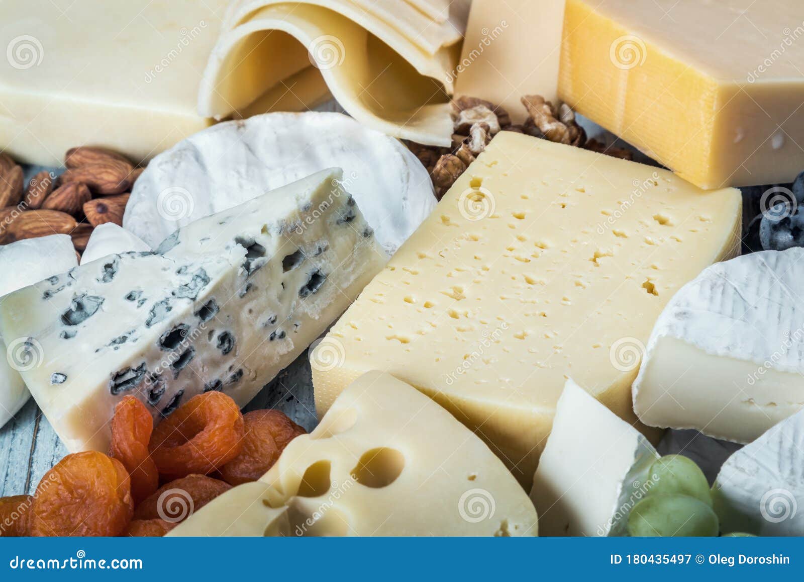 Different Types of Cheese with Fruits, Nuts and Snacks Stock Image ...