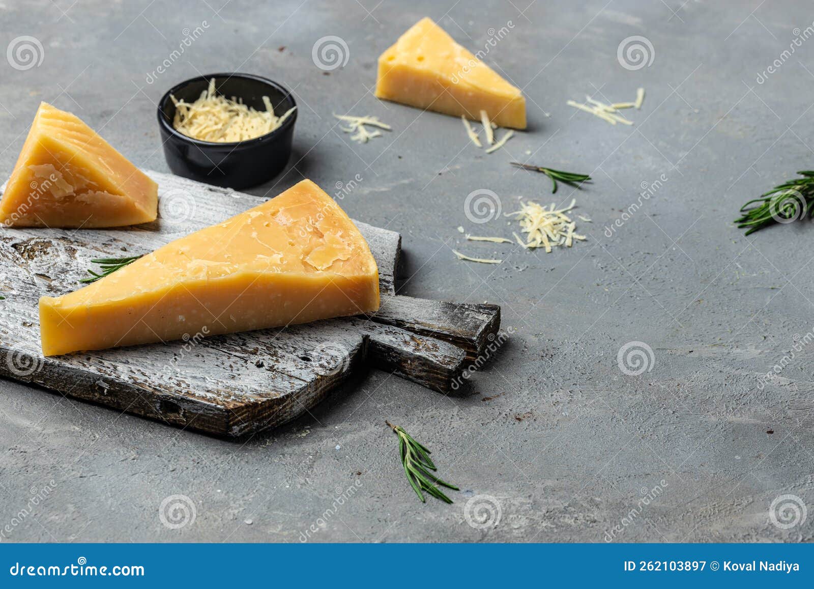 Different Types of Cheese. Parmesan Cheese with Rosemary on a Gray ...