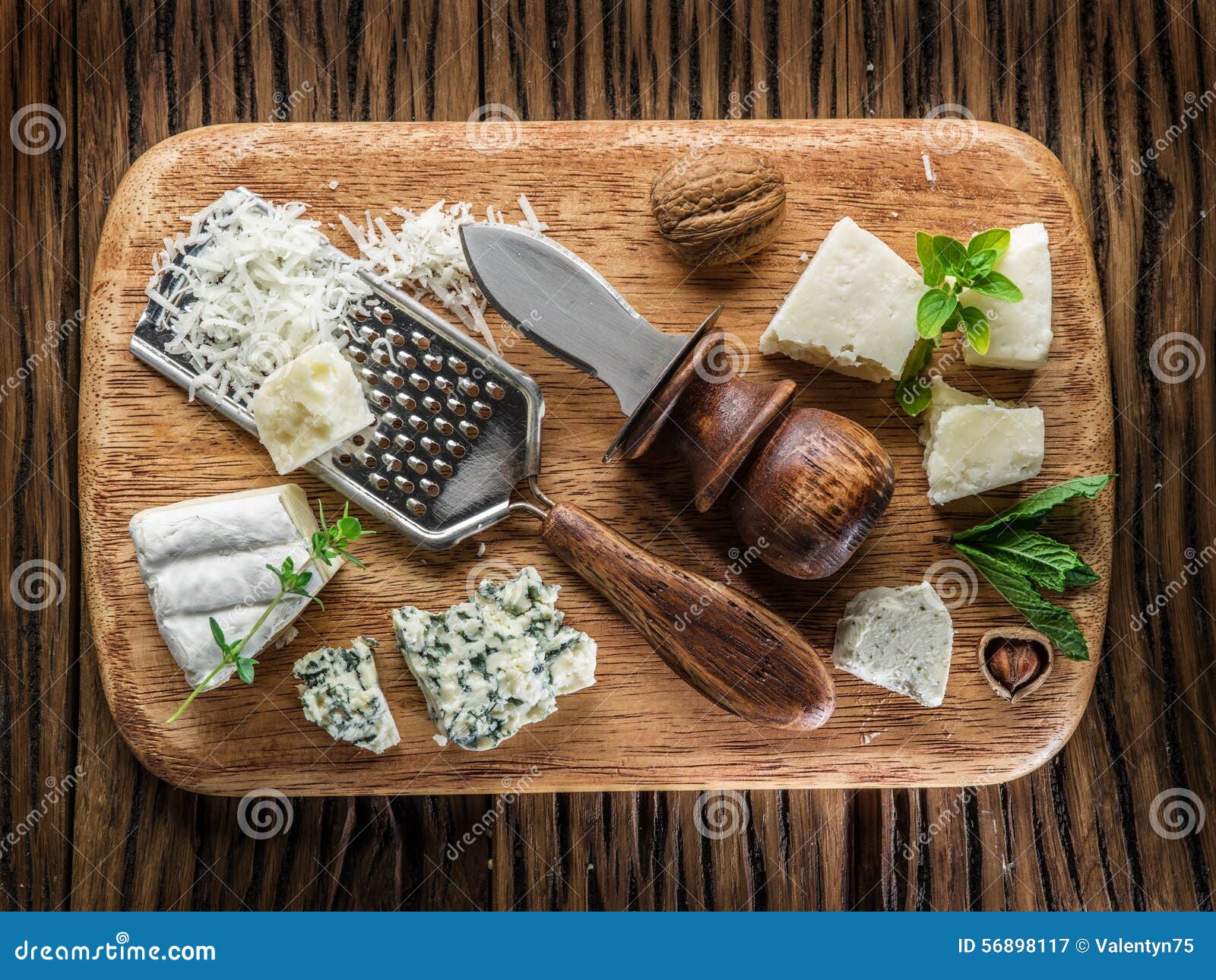 Different Types of Cheeses with Nuts and Herbs. Stock Image - Image of ...