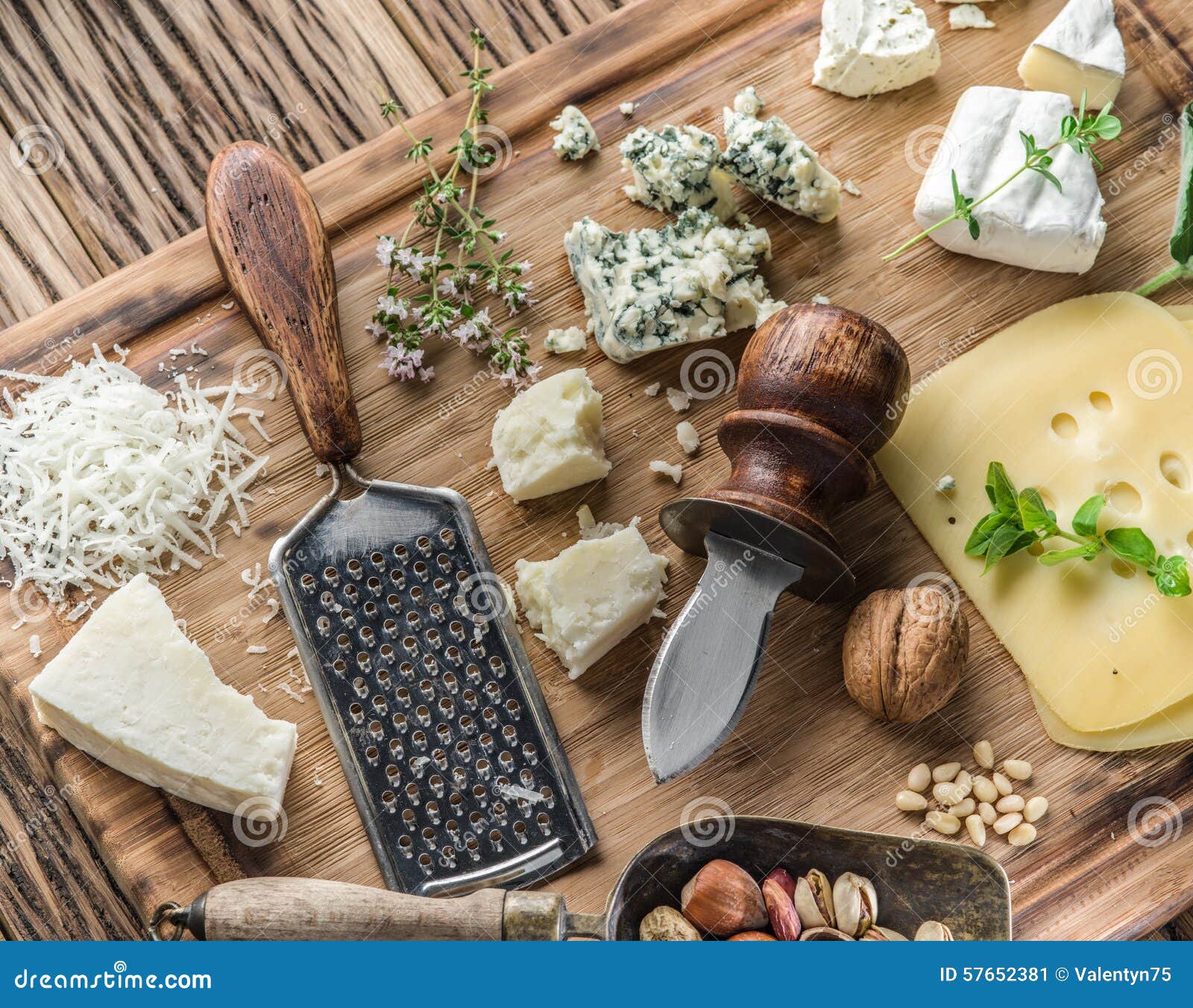 Different Types of Cheeses with Nuts and Herbs. Stock Image - Image of ...