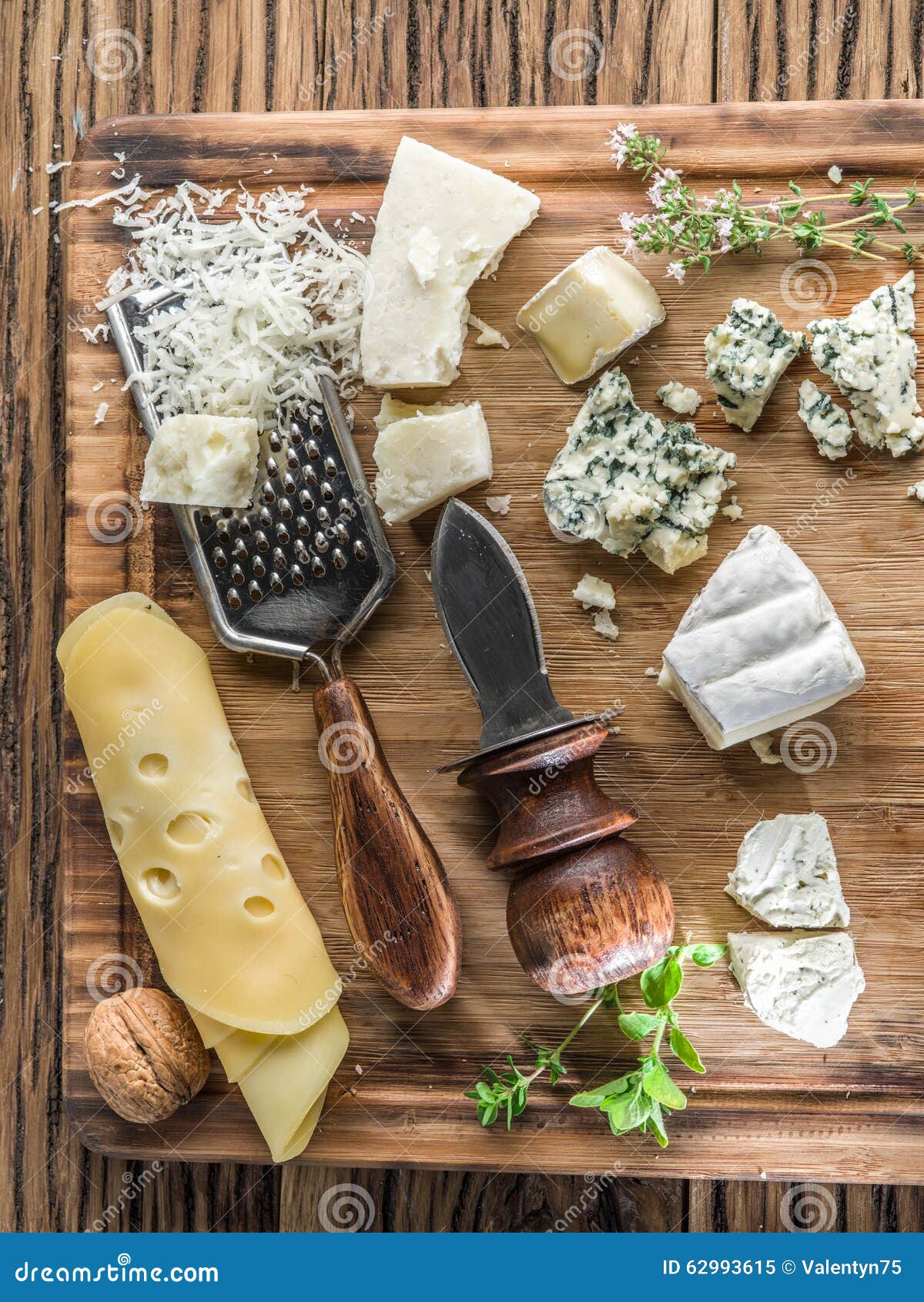 Different Types of Cheeses with Nuts and Herbs. Stock Image - Image of ...