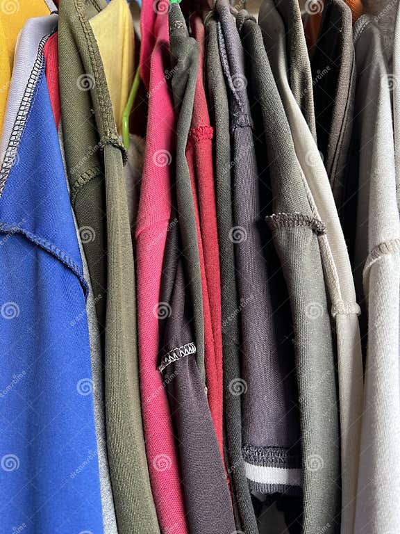 Different Types of Clothes in a Row Stock Photo - Image of fabric, blue ...