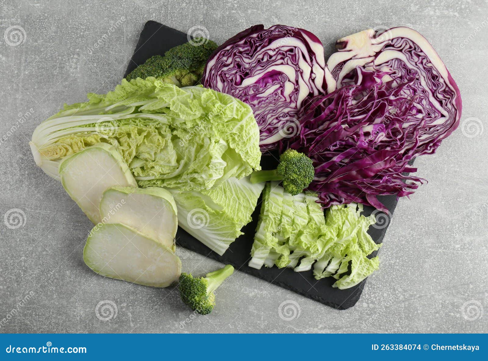 Different Types of Cut Cabbage on Light Grey Table, Flat Lay Stock ...