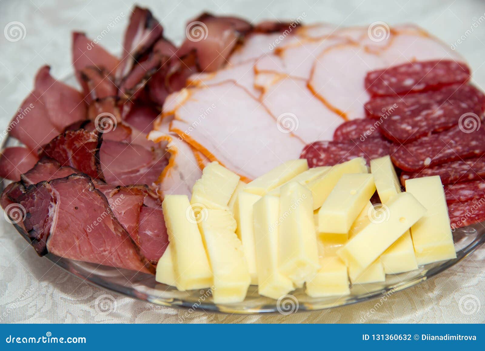 Different Types Delicacies of Meat and Cheese Arranged in a Plate Over ...