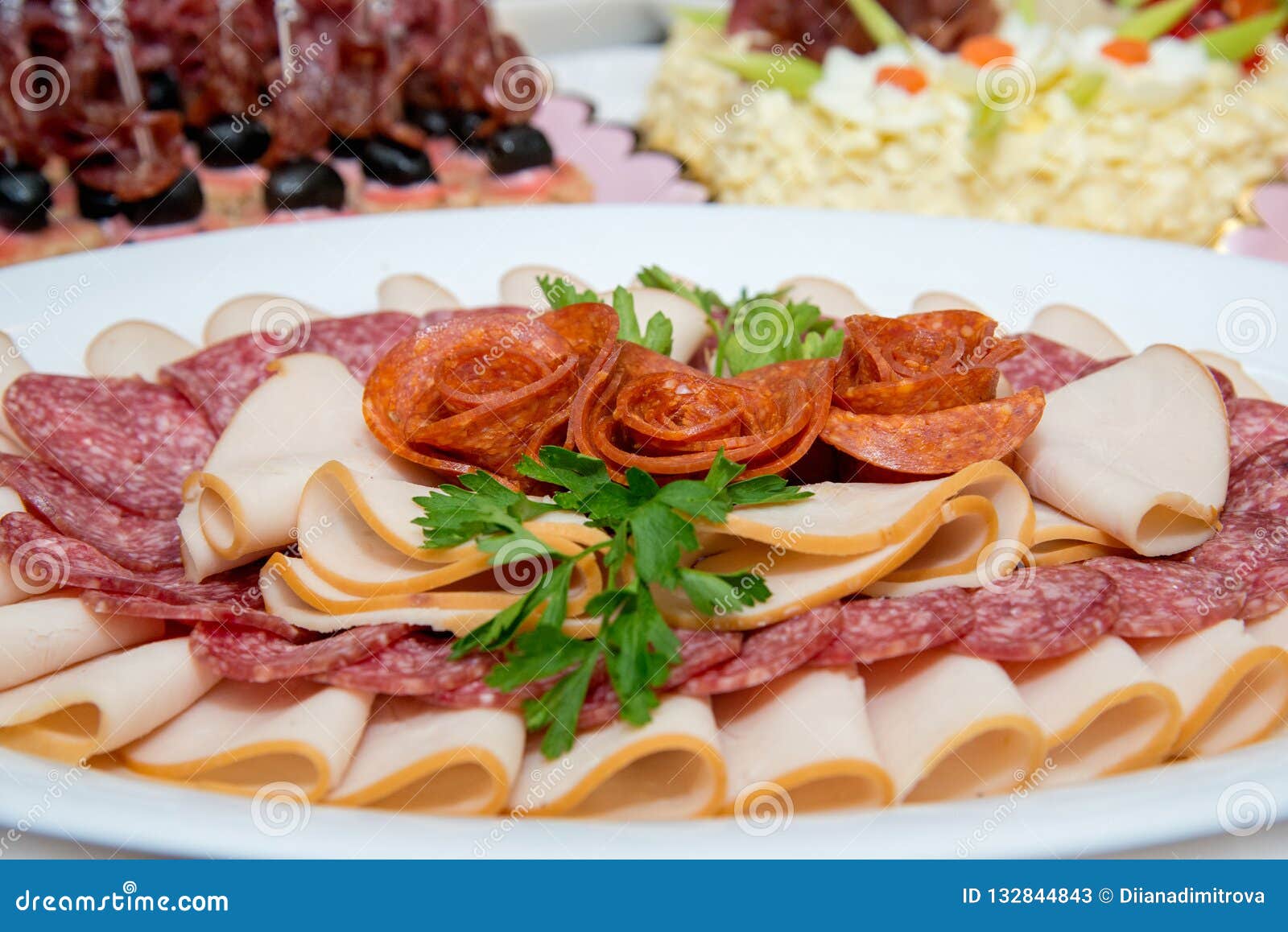 Different Types Delicacies of Meat and Cheese Arranged in a Plate Over ...