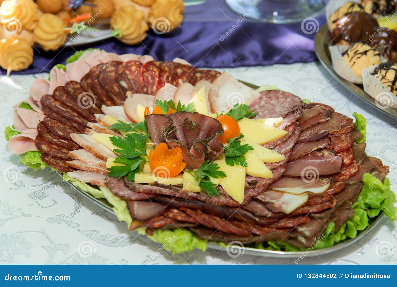 Different Types Delicacies of Meat and Cheese Arranged in a Plate Over ...