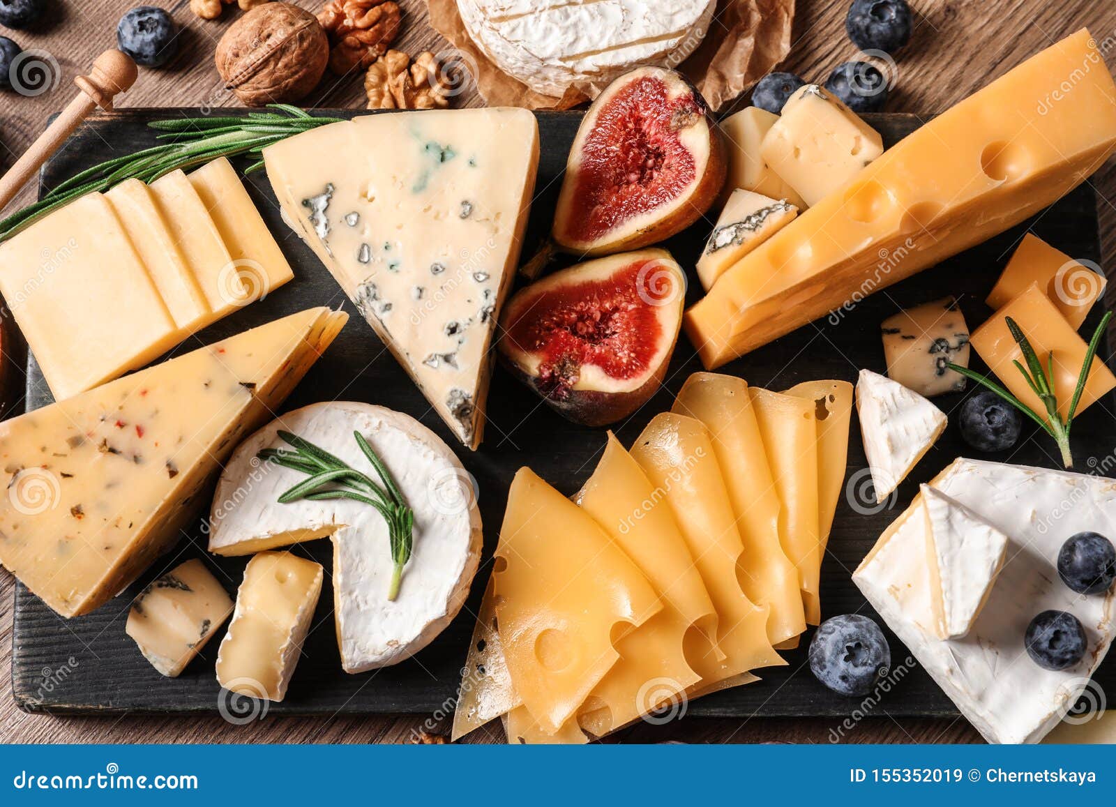 Different Types of Delicious Cheese Served on Slate Board Stock Image ...