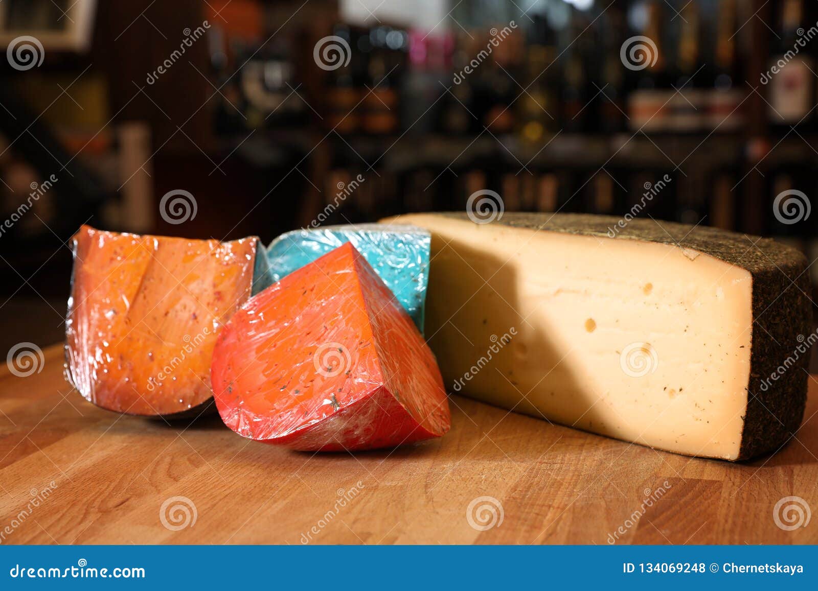 Different Types of Delicious Cheeses on Counter Stock Photo - Image of ...