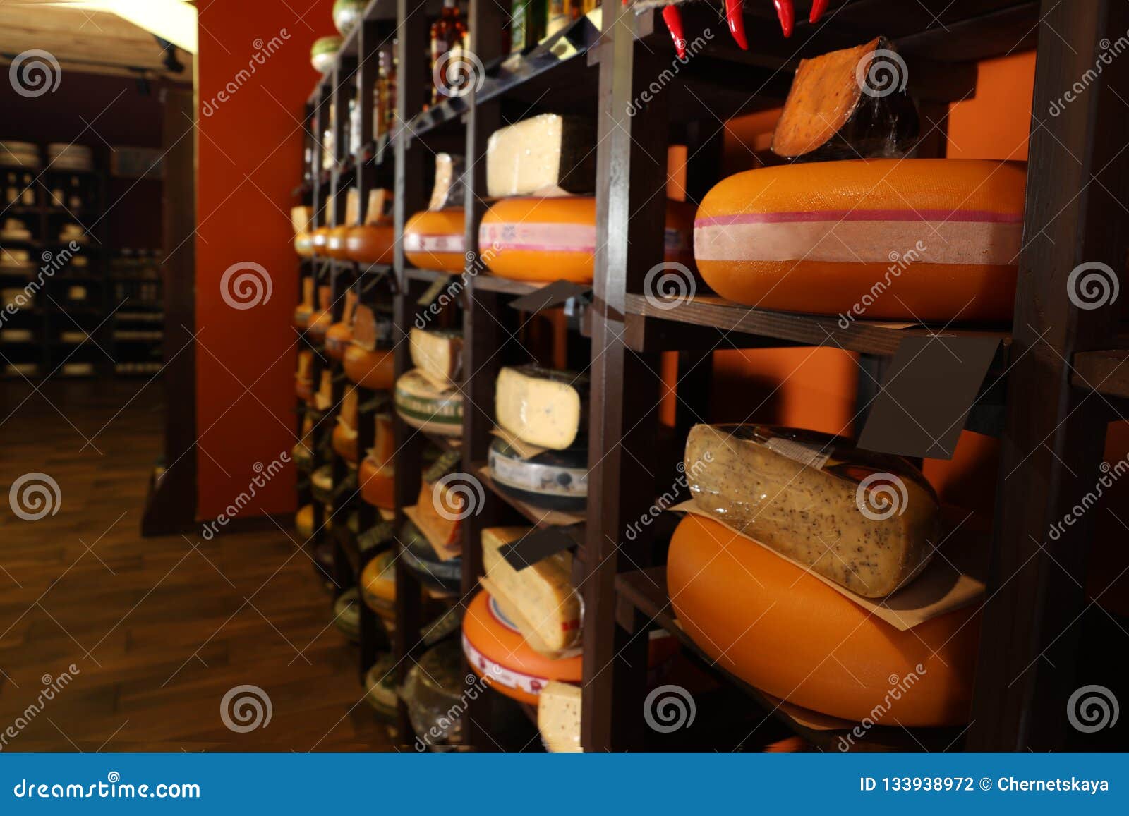 Different Types of Delicious Cheeses on Rack Stock Photo - Image of ...