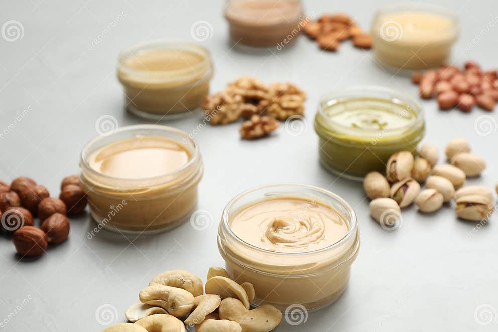 Different Types of Delicious Nut Butters and Ingredients on Light Table ...