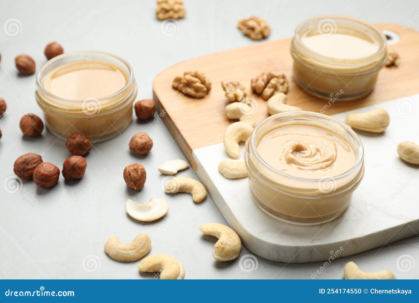 Different Types of Delicious Nut Butters and Ingredients on Light Table ...