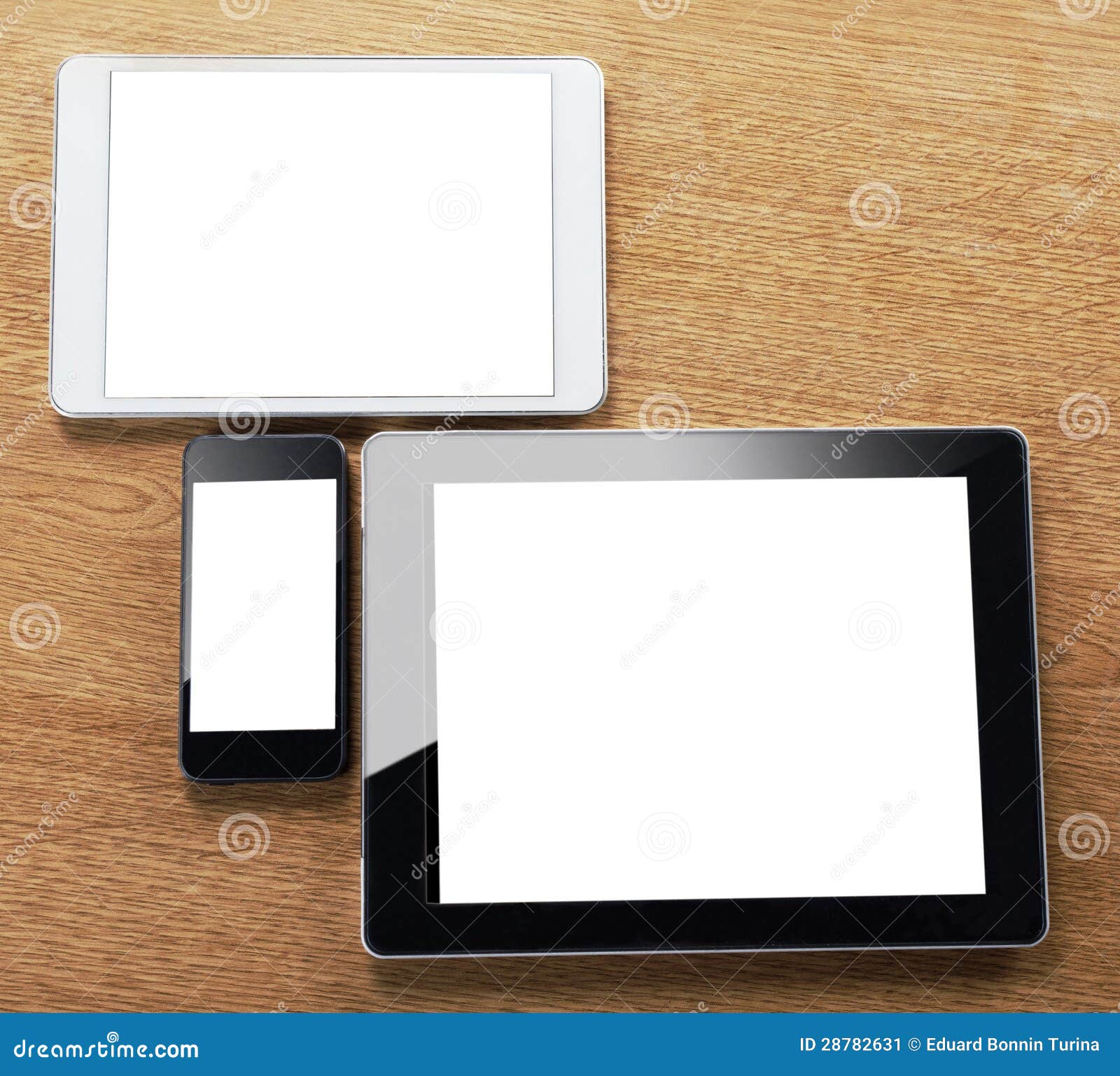 Different Types of Digital Tablet and Smart Phone on a Desktop Stock ...