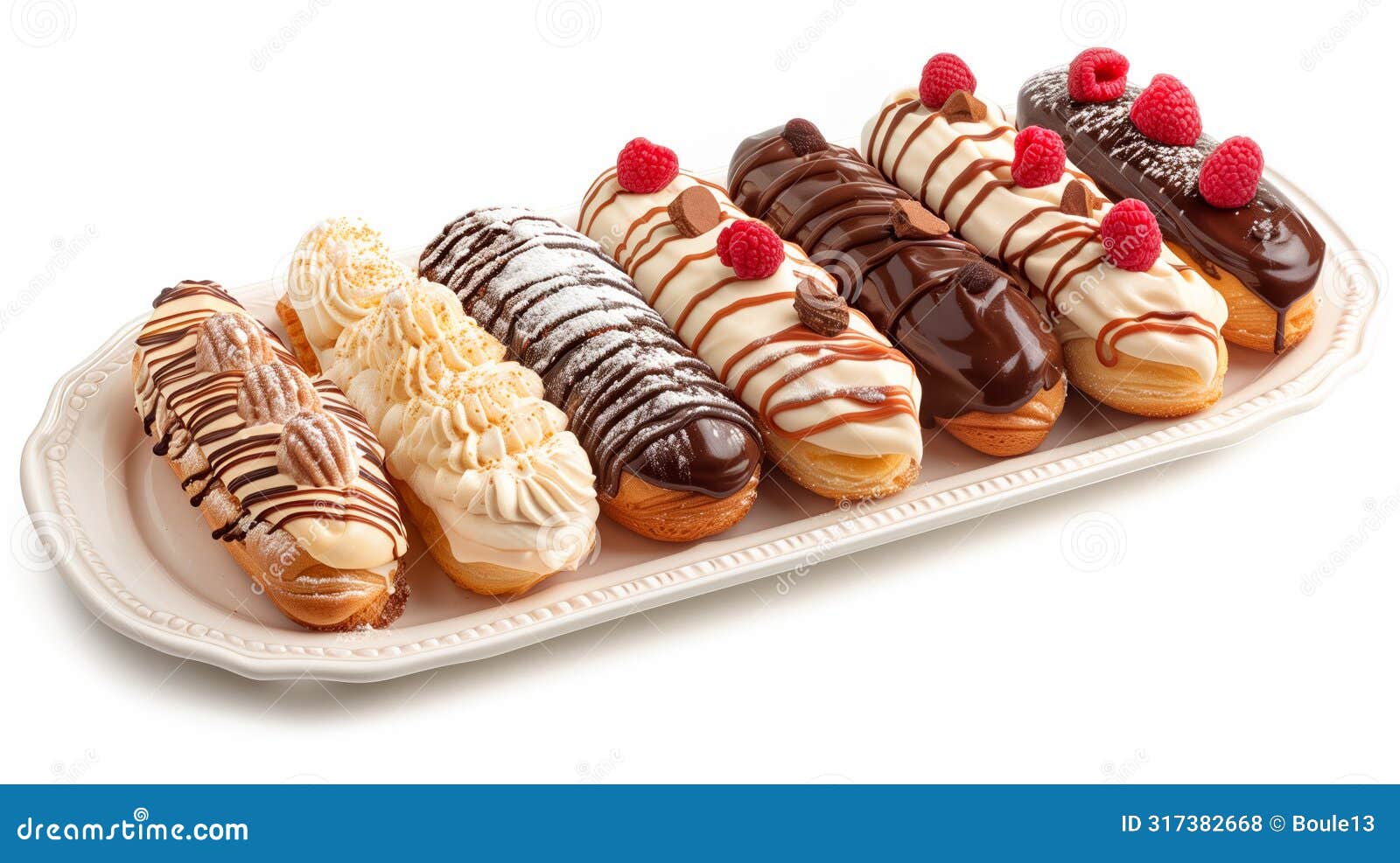 Different Types of Eclairs Topped with Nuts, Berries and Chocolate on a ...
