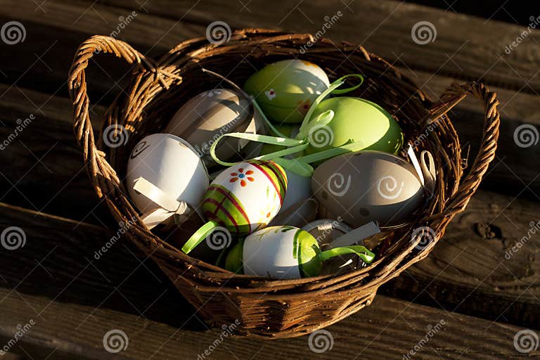 Different Types of Eggs in a Basket on a Wooden Surface Stock Photo ...