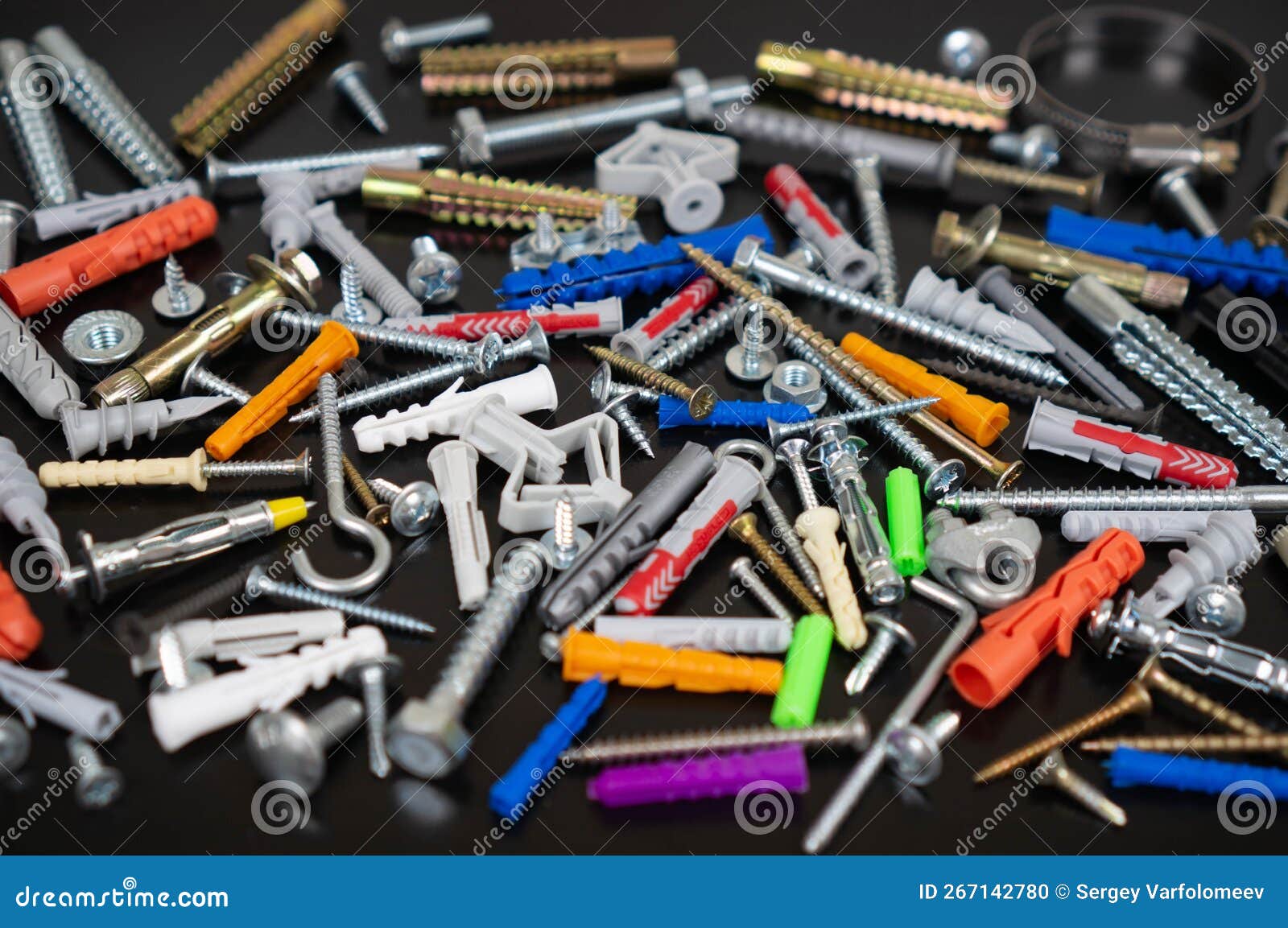 Different Types of Fasteners on a Dark Wood Background. Stock Photo ...