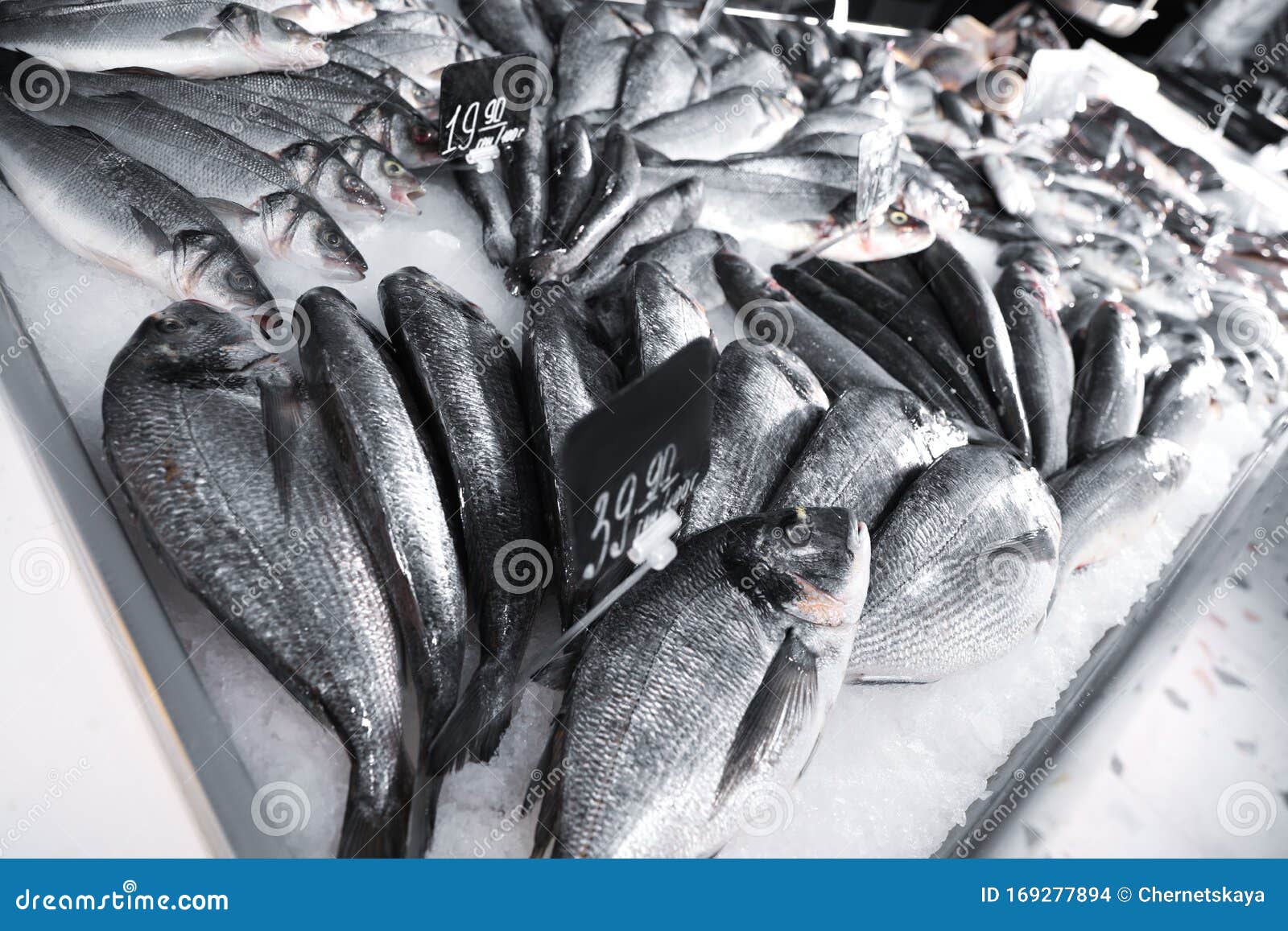 Different Types of Fish on Ice in Supermarket Stock Photo - Image of ...