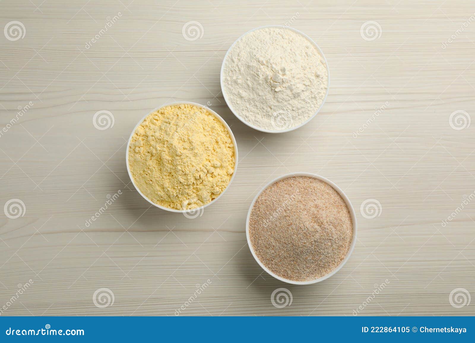Different Types of Flours in Bowls on White Wooden Table, Flat Lay ...