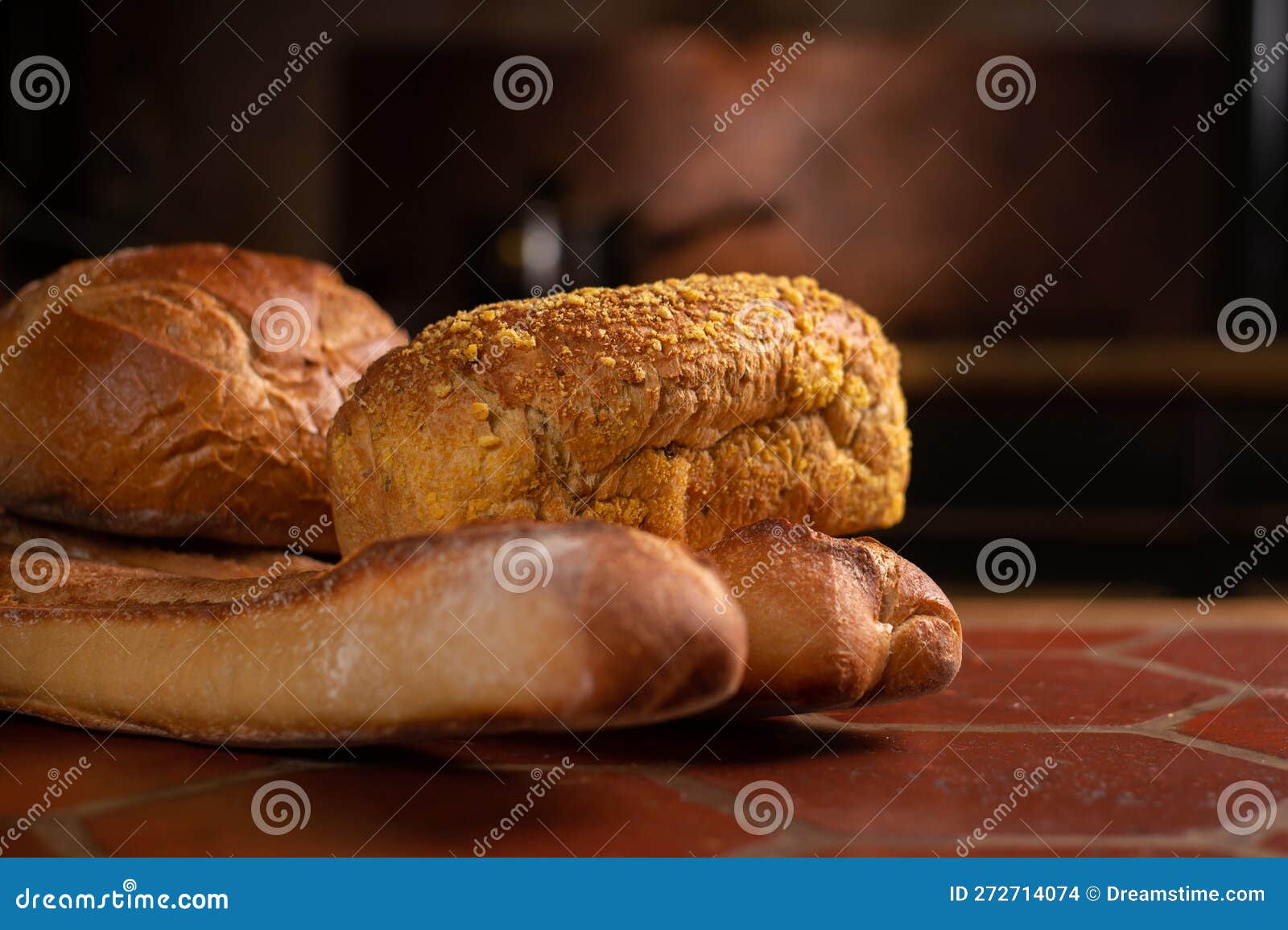 Different Types of French Bread on the Table. Baguettes, Round Bread ...