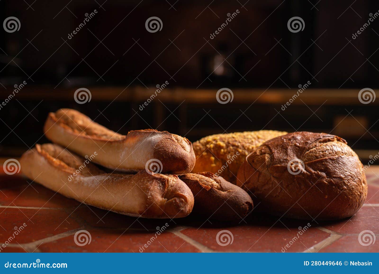 Different Types of French Bread on the Table. Baguettes, Round Bread ...