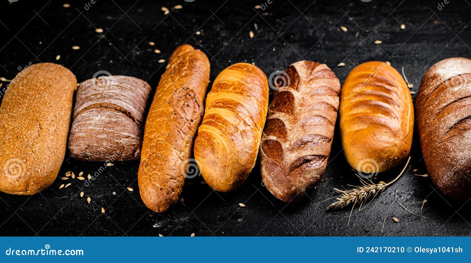 Different Types of Fresh Bread on the Table. Stock Photo - Image of ...