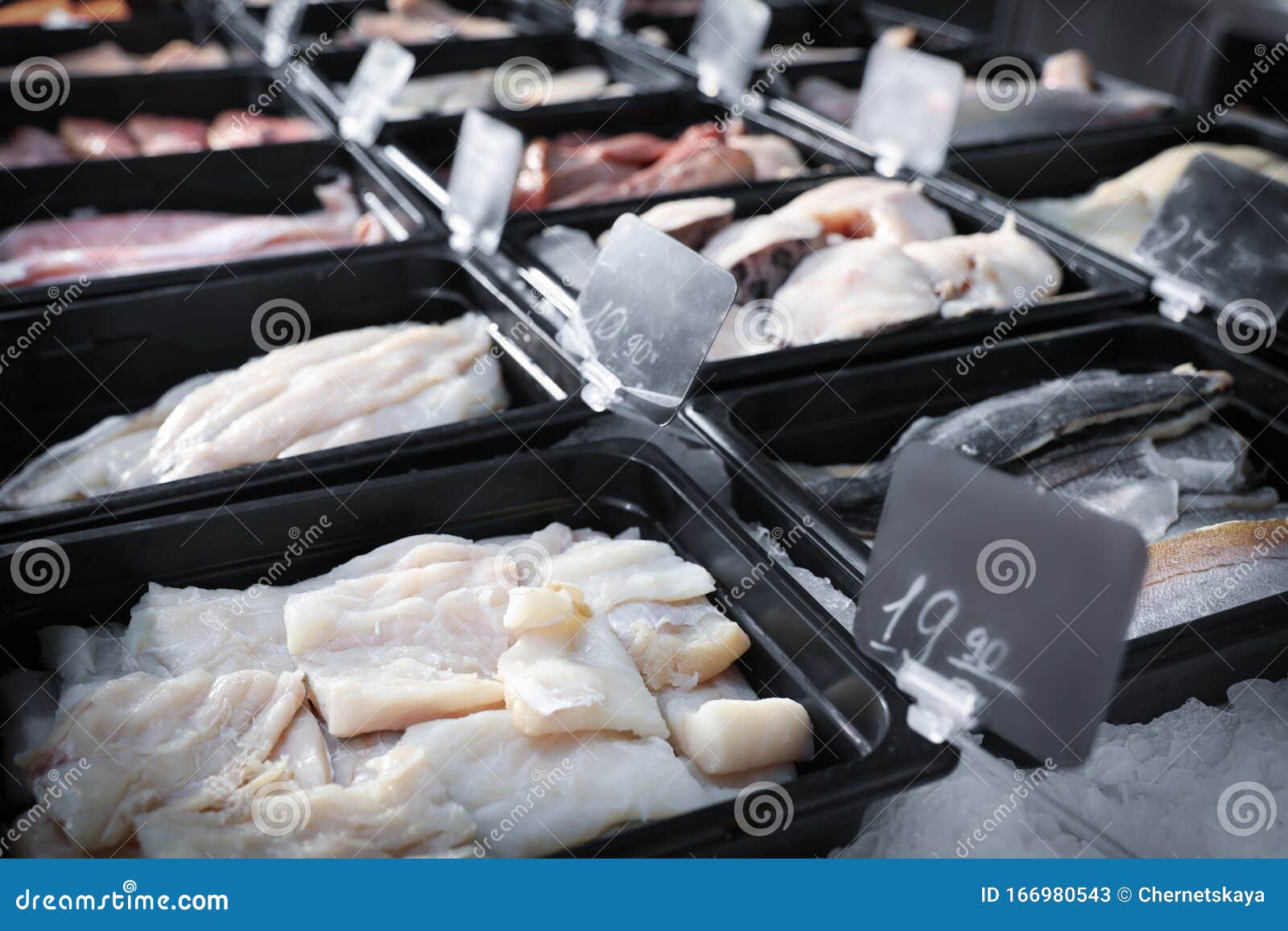 Different Types of Fish on Display with Ice. Wholesale Market Stock ...