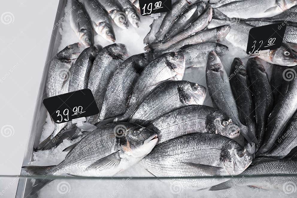 Different Types of Fish on Ice in Supermarket Stock Image - Image of ...