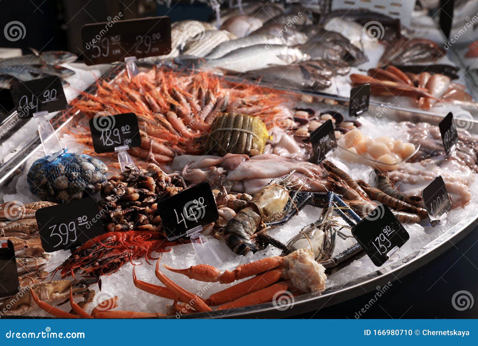 Different Types of Fresh Seafood on Ice in Store Stock Photo - Image of ...