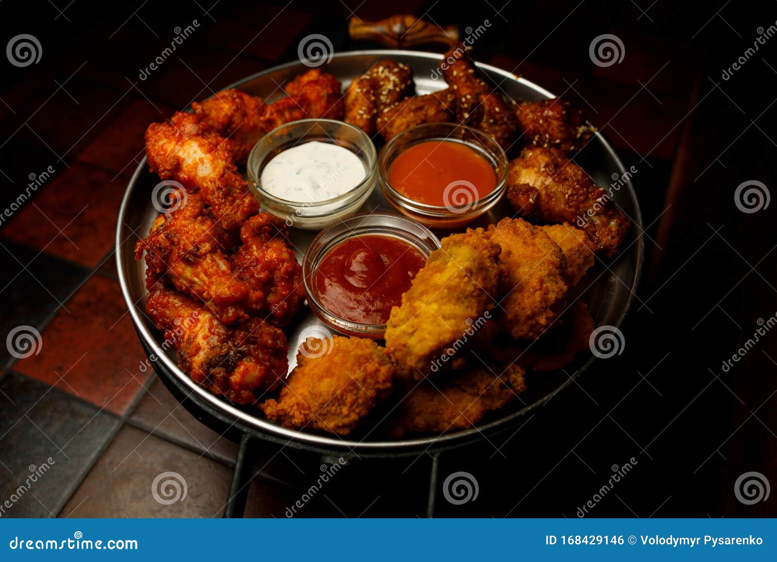 Different Types of Fried Meat and Sauces in a Plate. Stock Photo ...