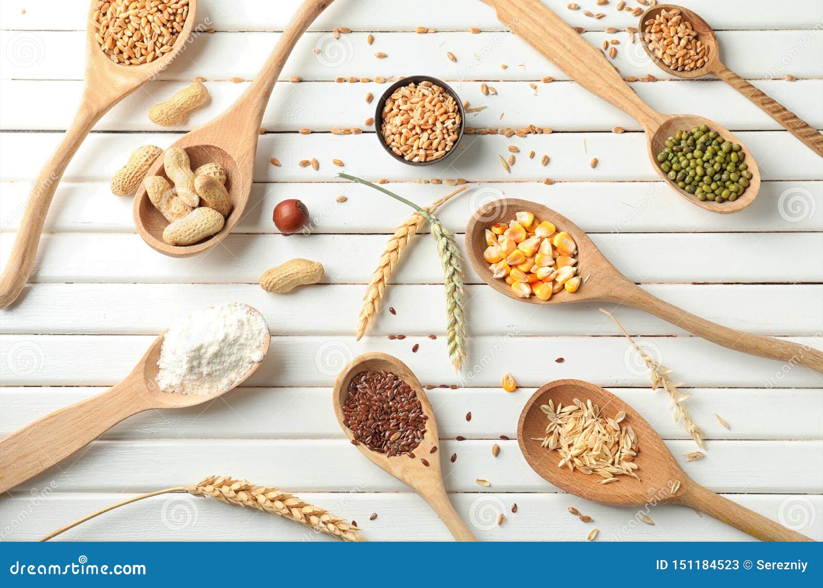 Different Types of Grains and Cereals on White Wooden Table Stock Image ...