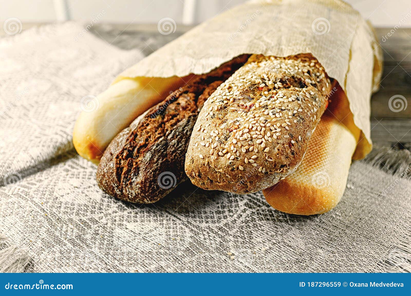 Different Types of Home-baked Bread are on the Table. Food Background ...