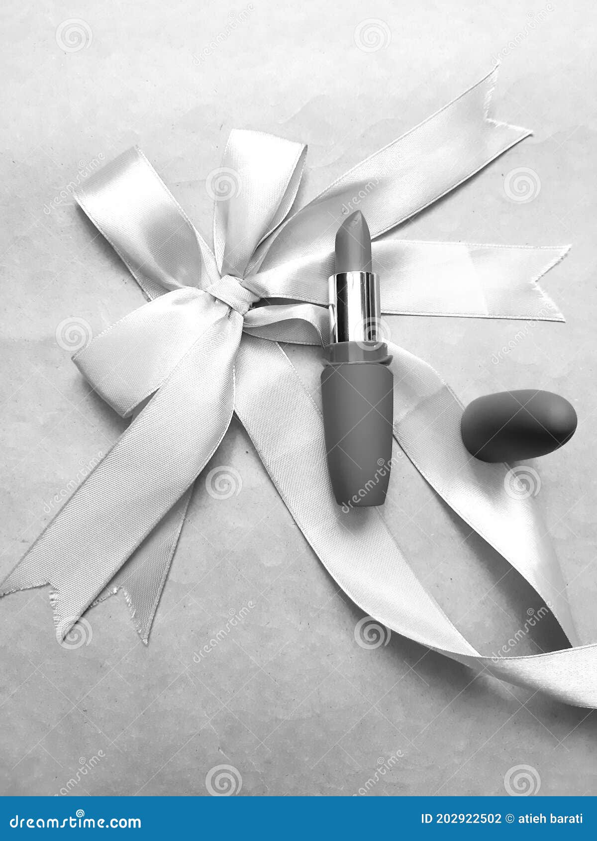 Lipstick and ribbons stock photo. Image of lipstick - 202922502