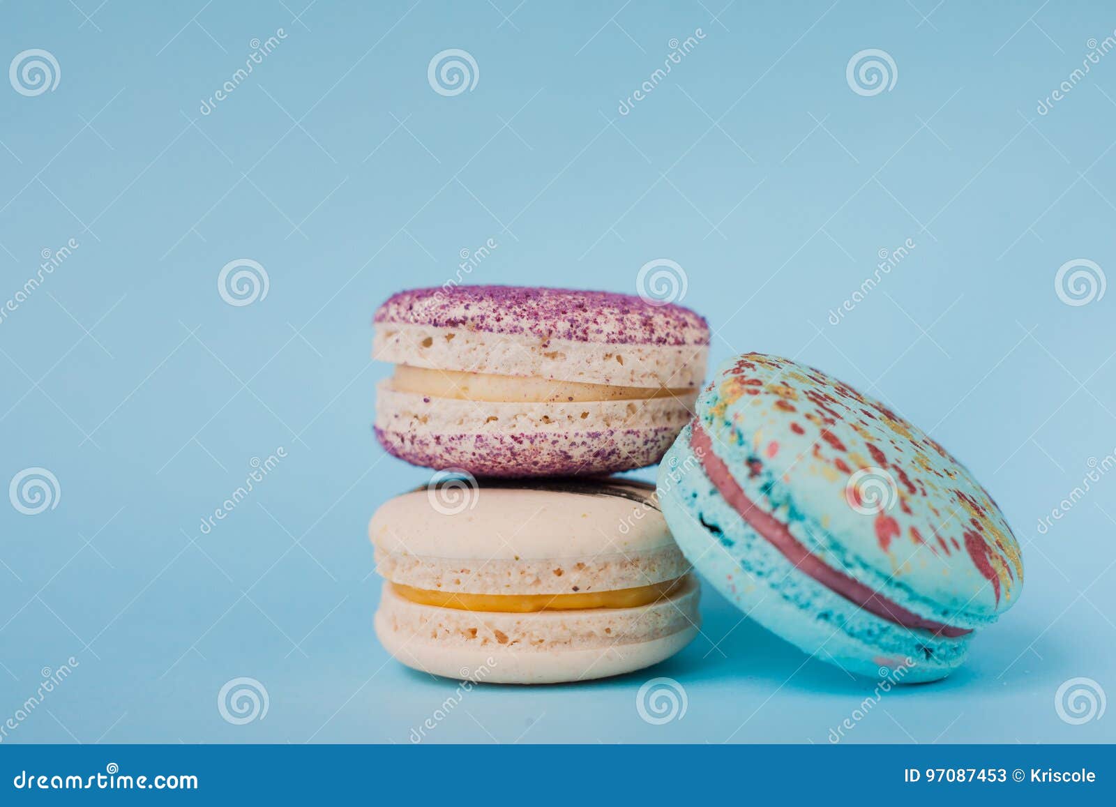 Different Types of Macaroons on a Blue Background Stock Image - Image ...