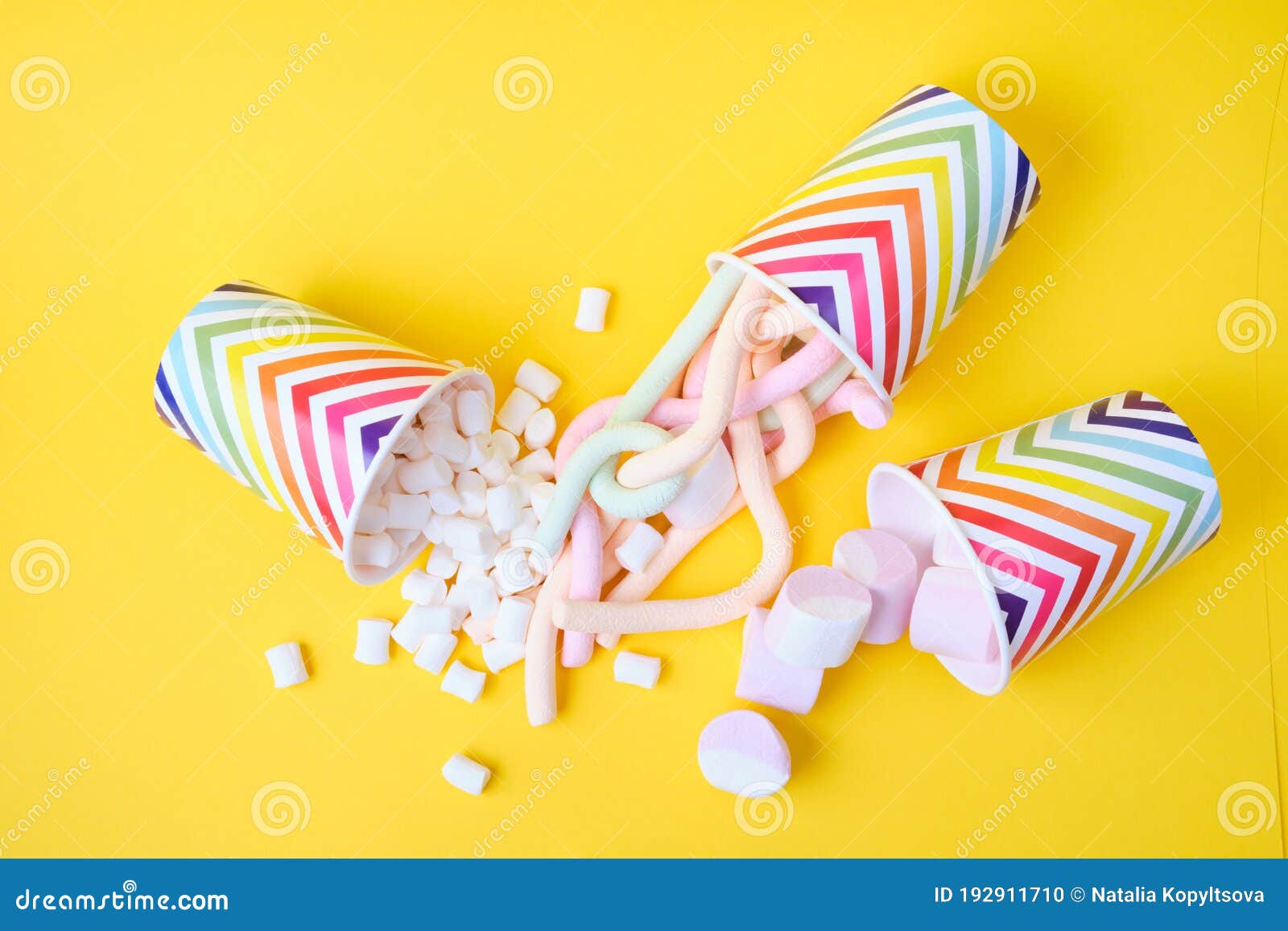 Different Types of Marshmallows Dropped from Festive Paper Cups with ...