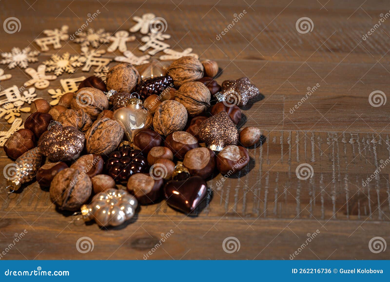 Different Types of Nuts and Christmas Tree Decorations are Arranged on ...