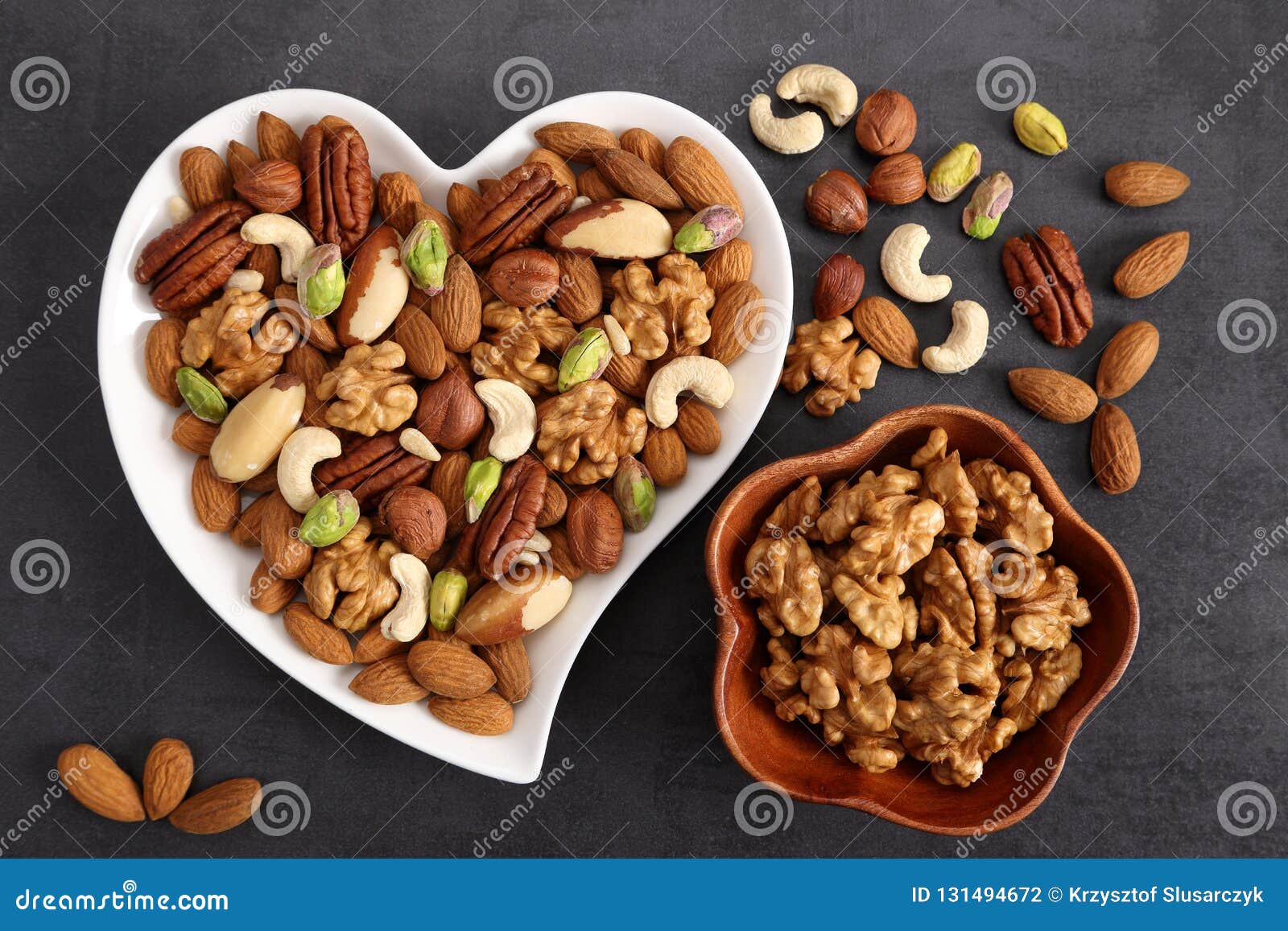 Nuts on a Plate in the Shape of a Heart. Stock Photo - Image of almond ...