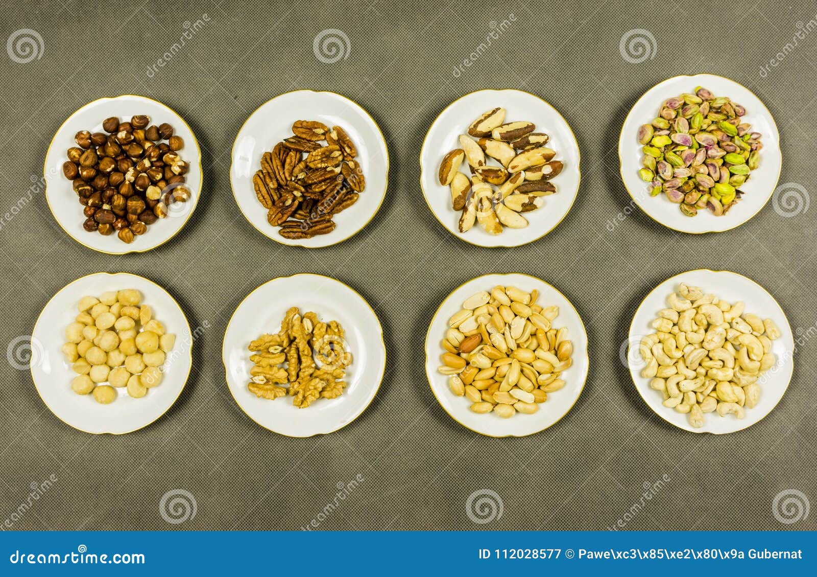Different Types of Nuts are Presented on the Plates. View from Above ...