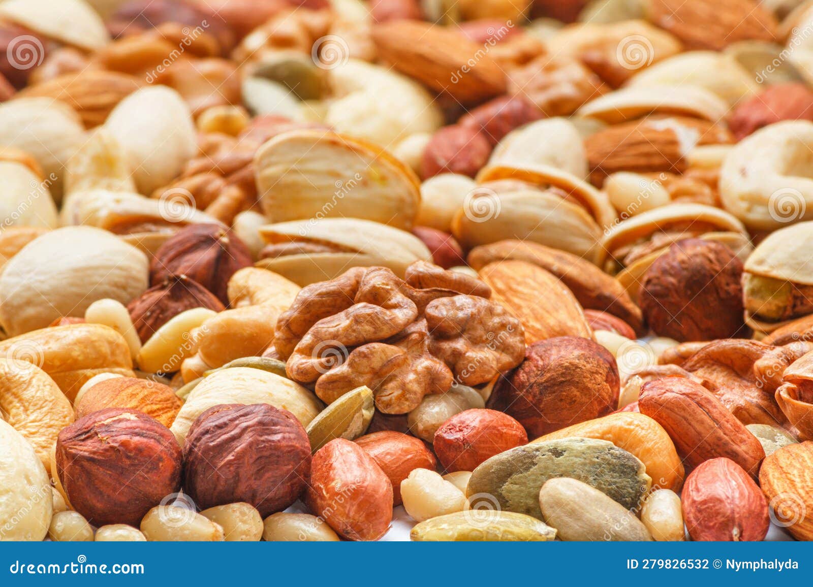 Different Types of Nuts and Seeds, Photo with Selective Focus. Peeled ...
