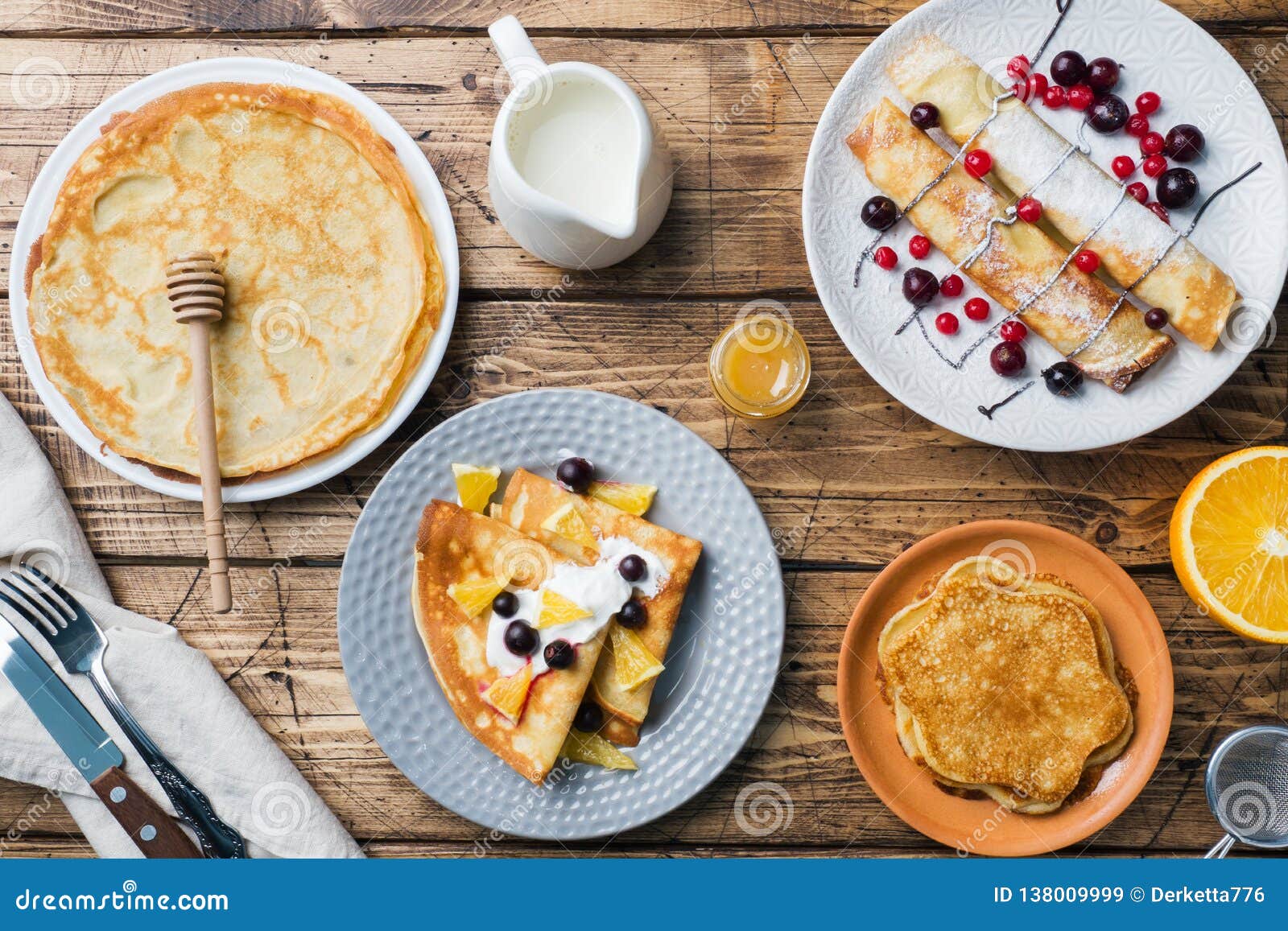 Different Types of Pancakes with Berries on a Wooden Table Stock Image ...