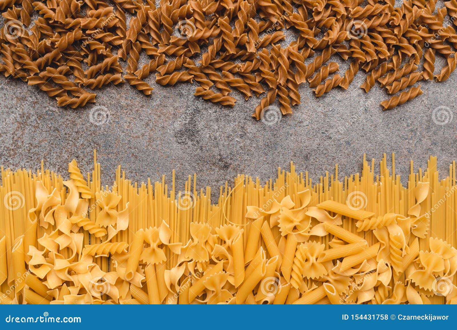 Dark and Light Pasta. Arranged on an Interesting and Dark Background ...