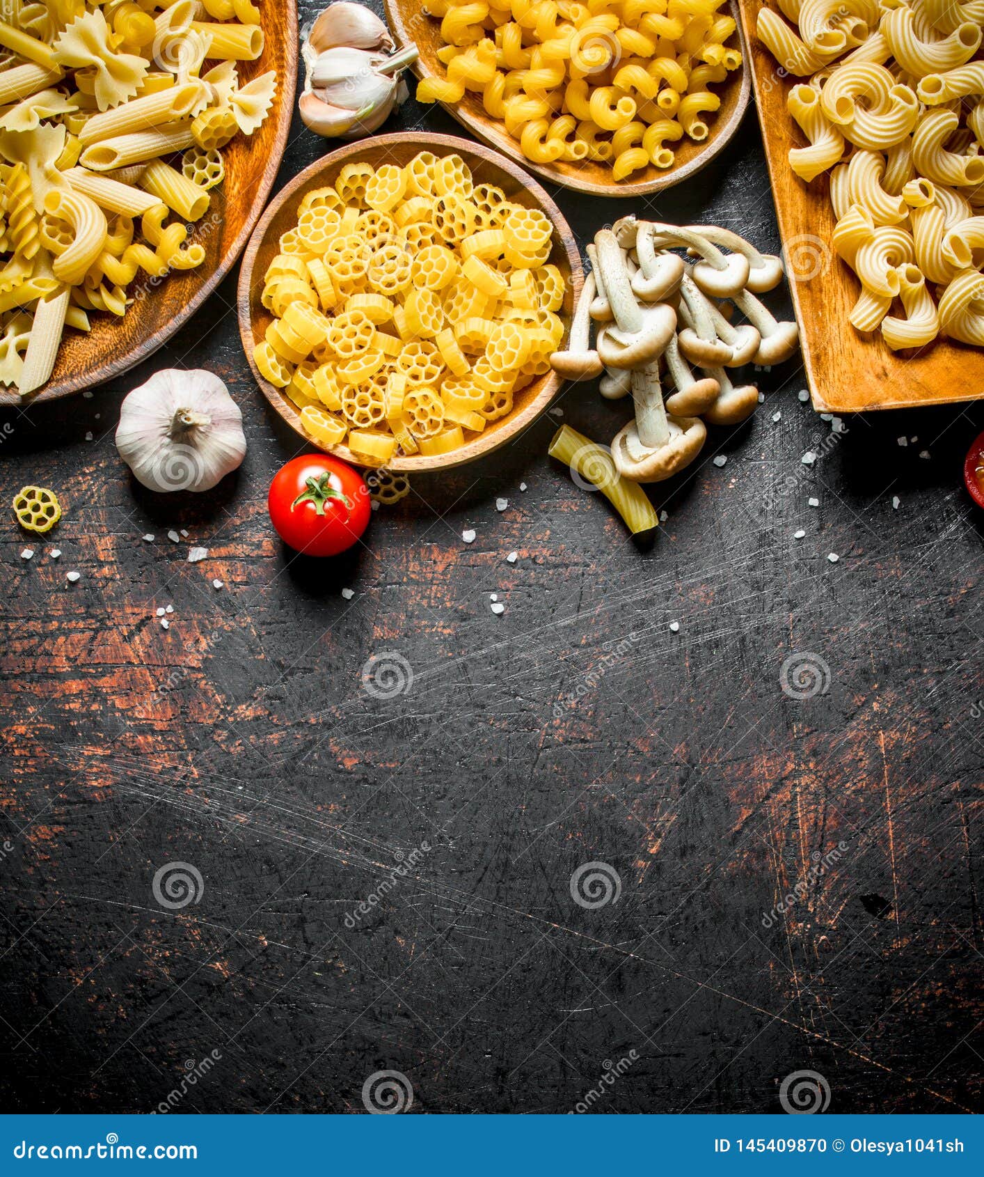 Different Types of Raw Paste on a Plate with Garlic and Mushrooms Stock ...