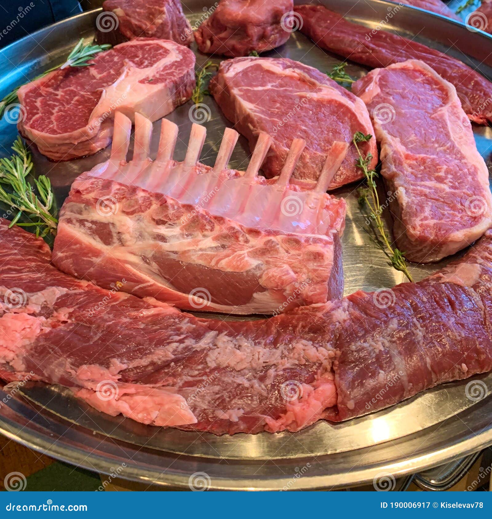 Different Types of Raw Steaks on a Metal Tray. Selective Focus Stock ...