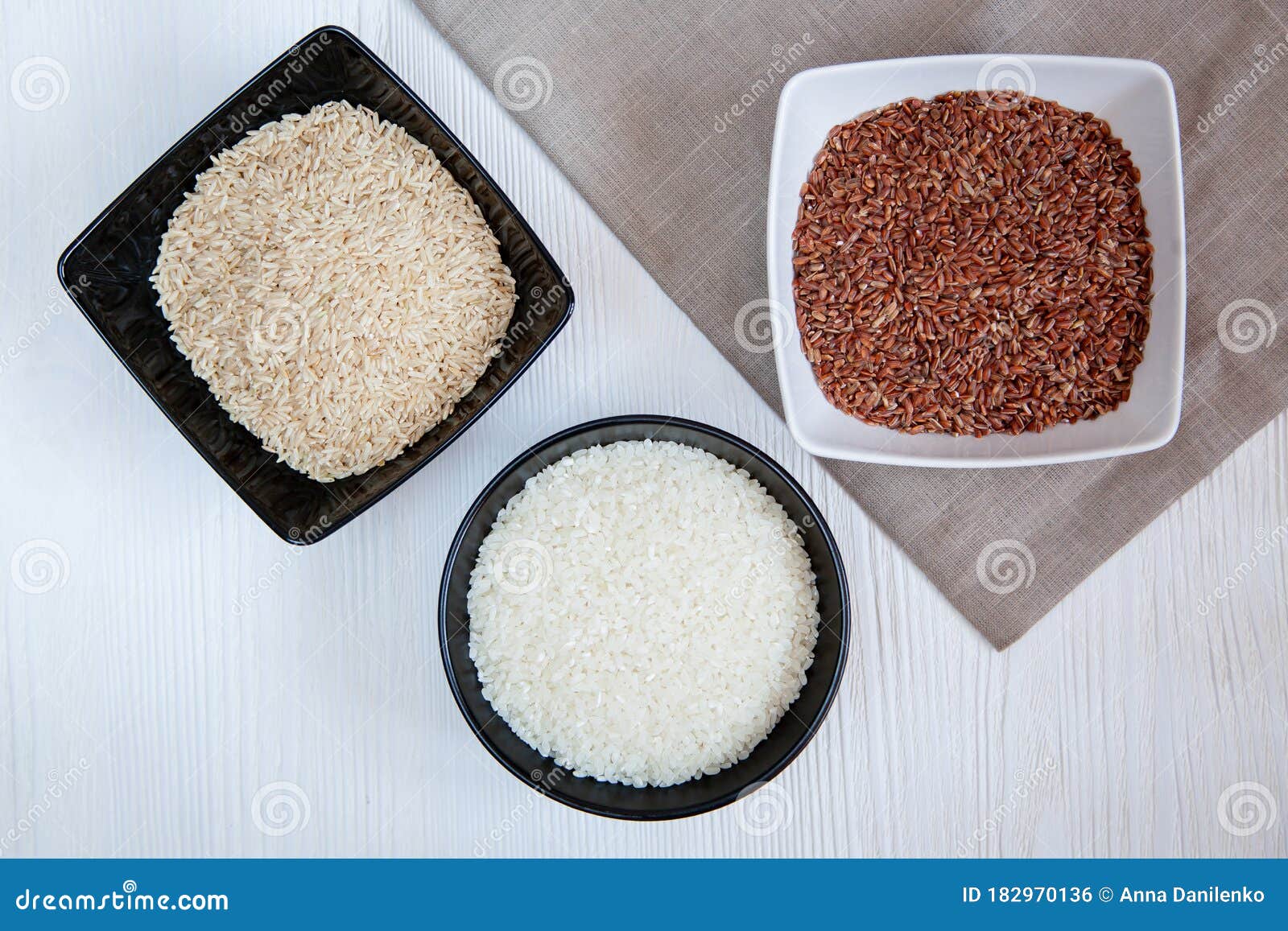 Different Types of Rice in Cups on the Table. White, Brown and Red ...