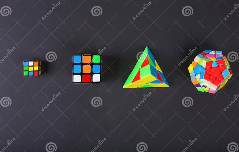 Different Types of Rubik`s Cube on Black Background. Different ...