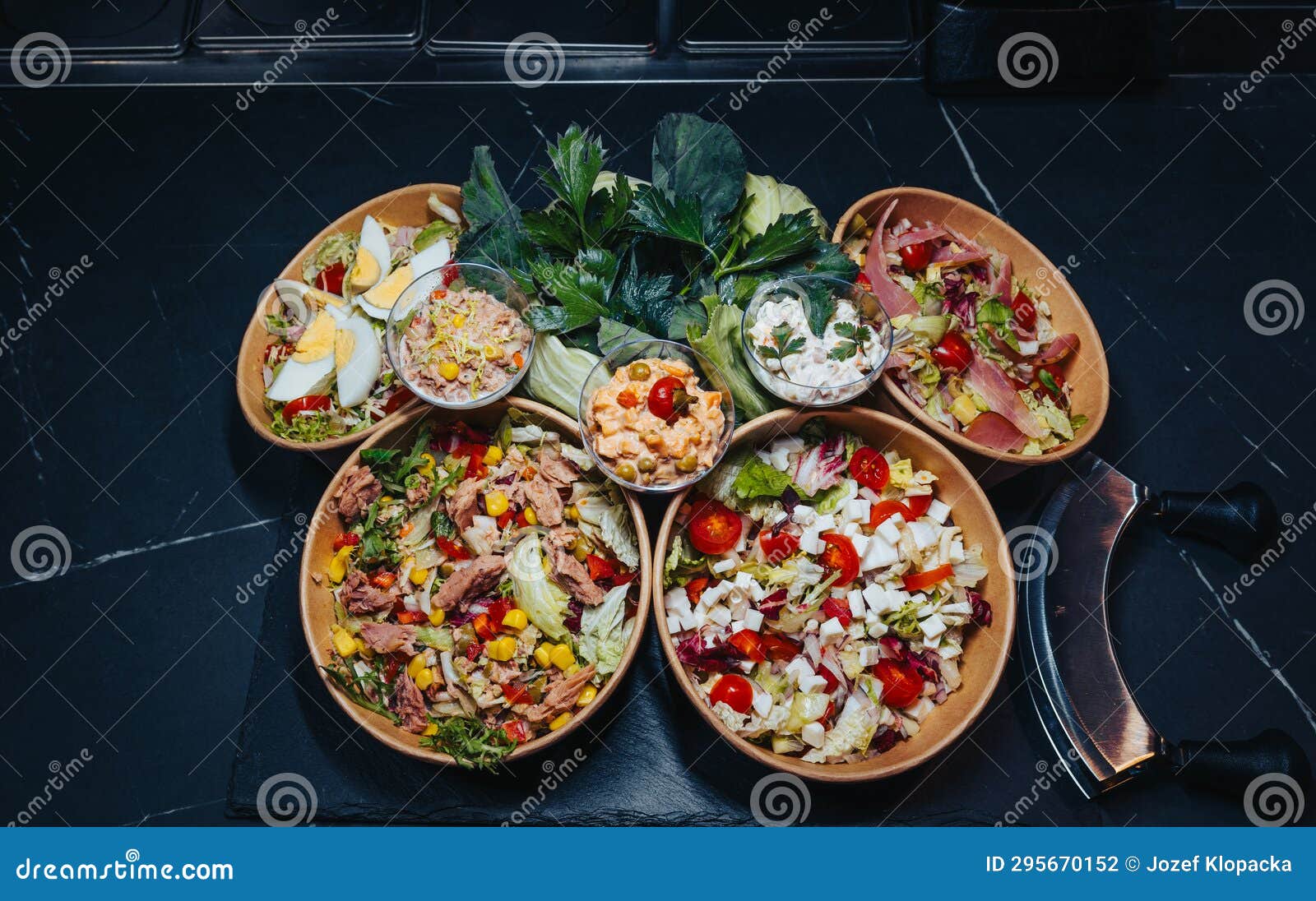 Different Types of Salads in a Bowl on a Table in a Restaurant. Stock ...