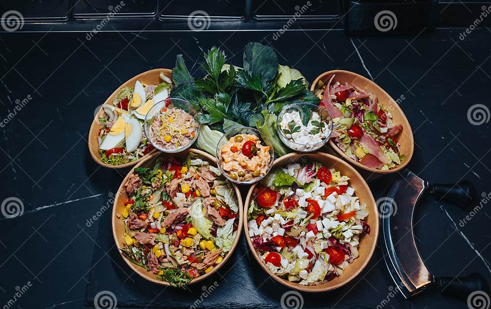 Different Types of Salads in a Bowl on a Table in a Restaurant. Stock ...